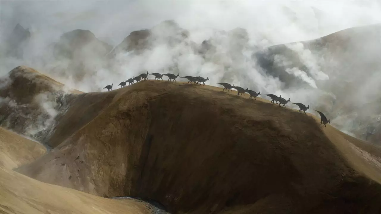 Un troupeau d'Olorotitans escaladant une grande dune. (Image : Pomme)