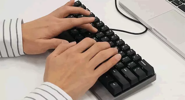 A Compact Semi-Portable Keyboard Ine Genuine Mechanical Keys